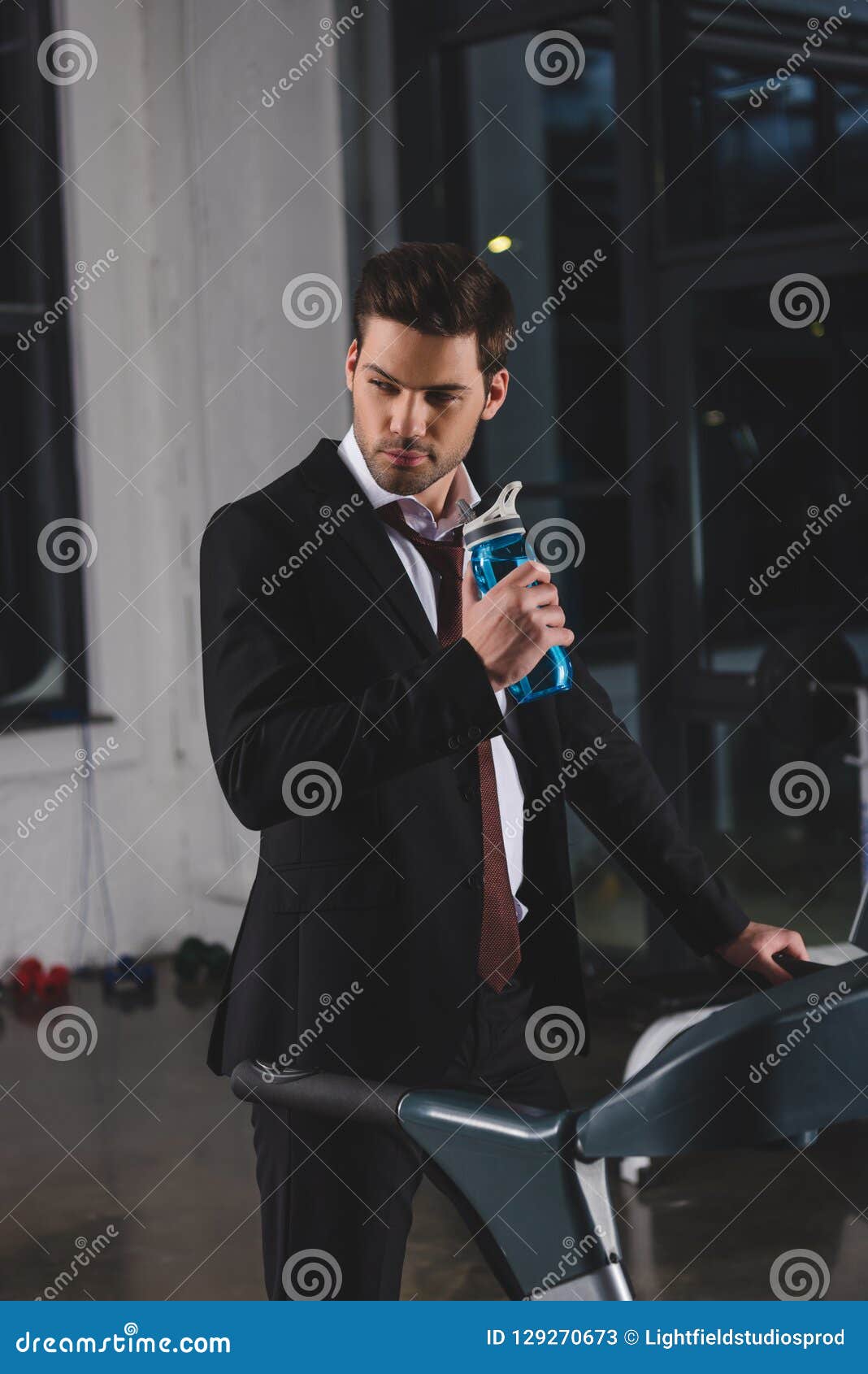 Manager in Suit Training on Treadmill with Sport Bottle Stock Image ...