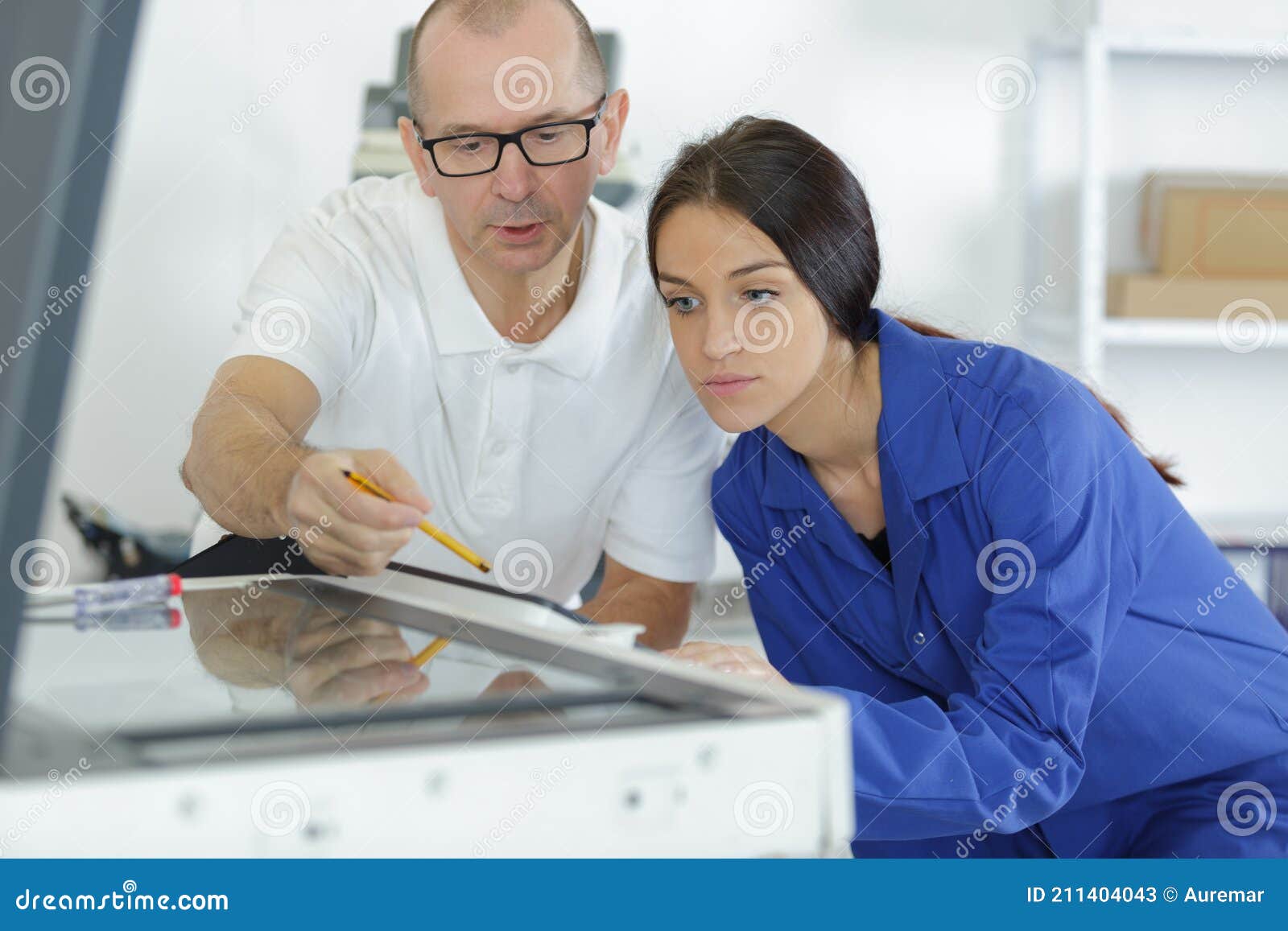 Manager Supervising Female Apprentice Stock Image - Image of apprentice ...