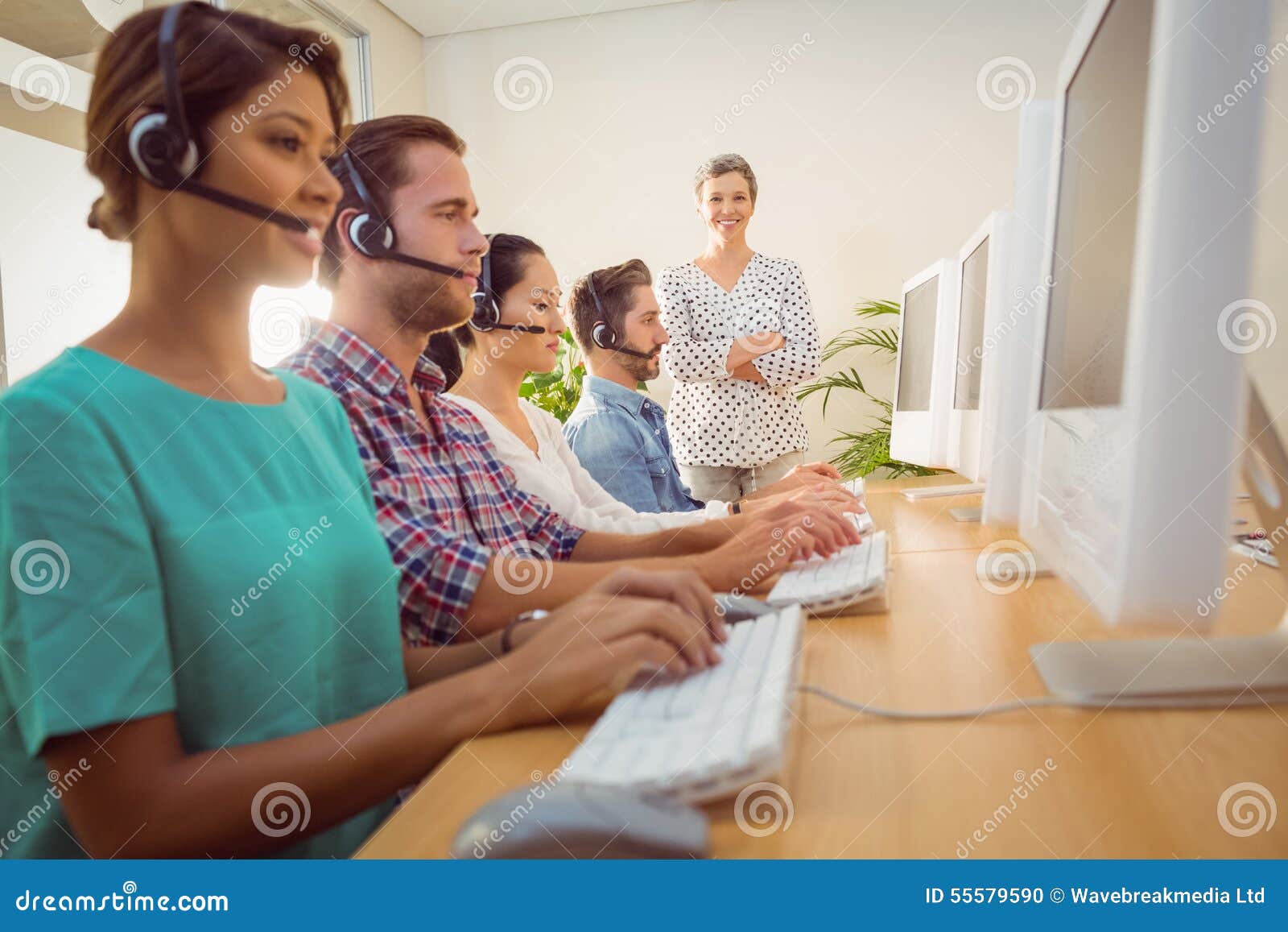 Manager Supervising Work in Call Center Stock Photo - Image of monitor ...
