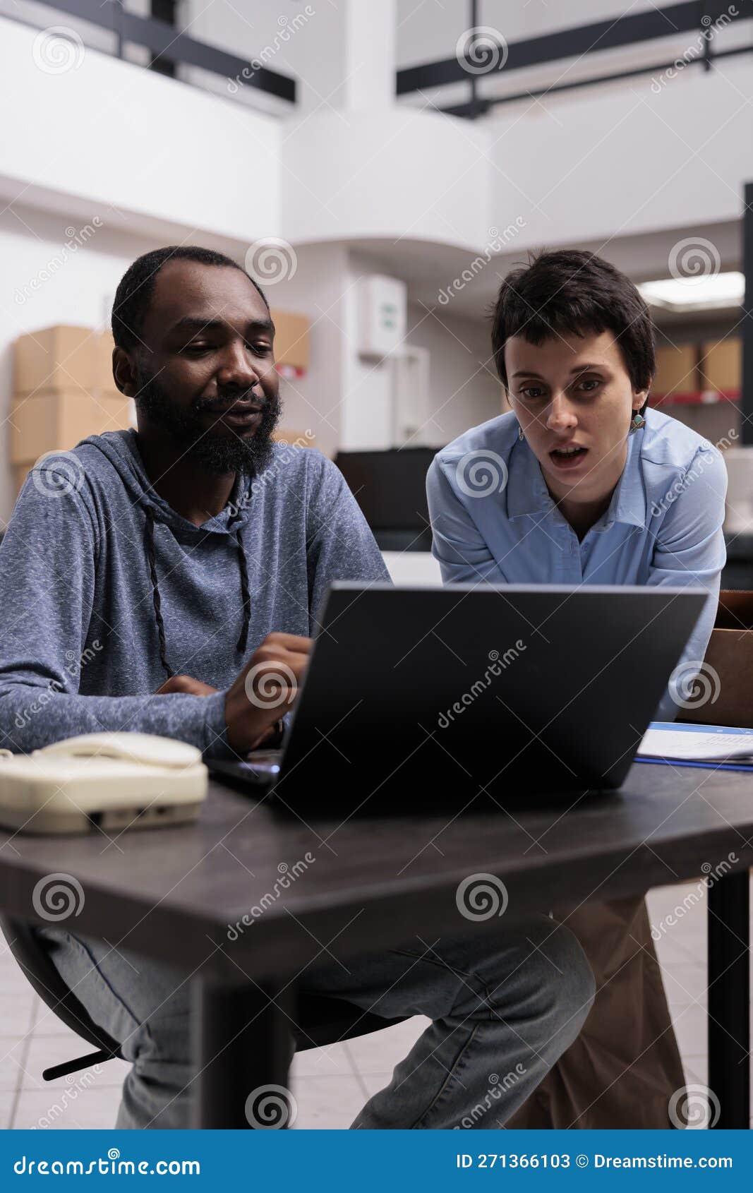 Manager and Supervisor Looking at Transportation Logistics on Laptop ...