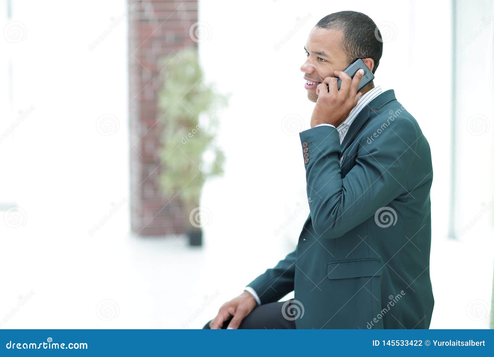 Manager Talking on Mobile Phone in Office Stock Photo - Image of news ...