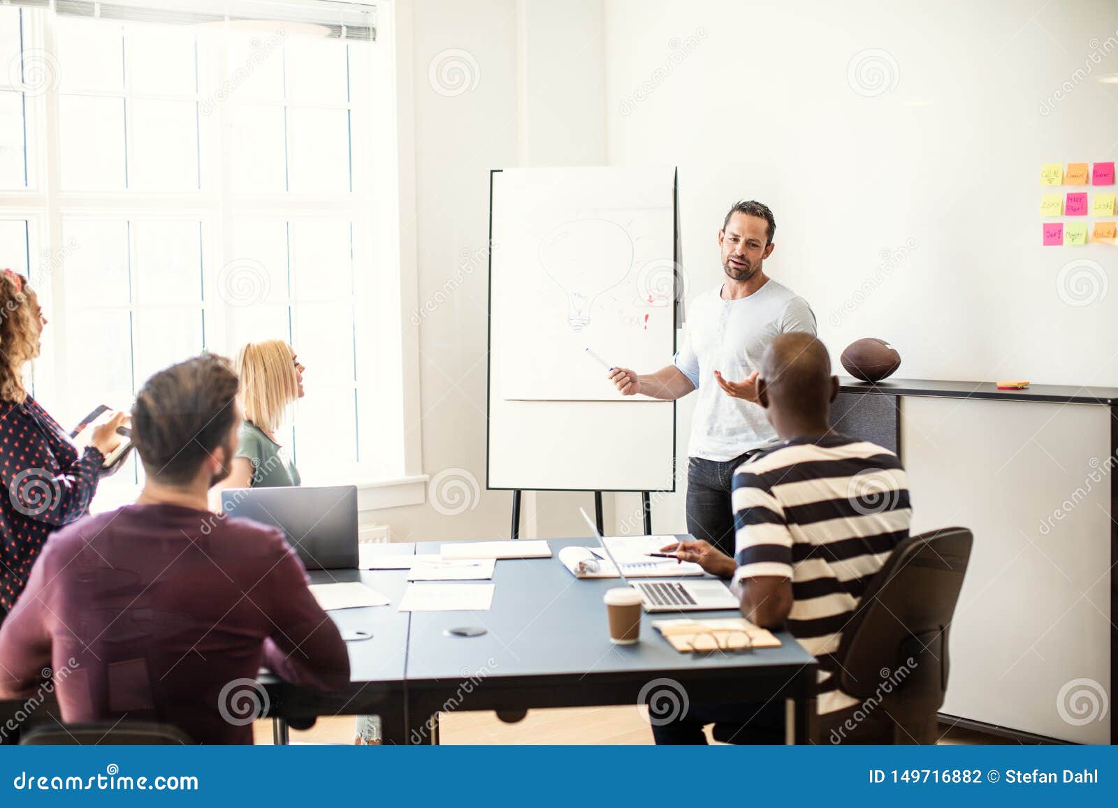 Manager Doing a Presentation for Staff in an Office Stock Photo - Image ...