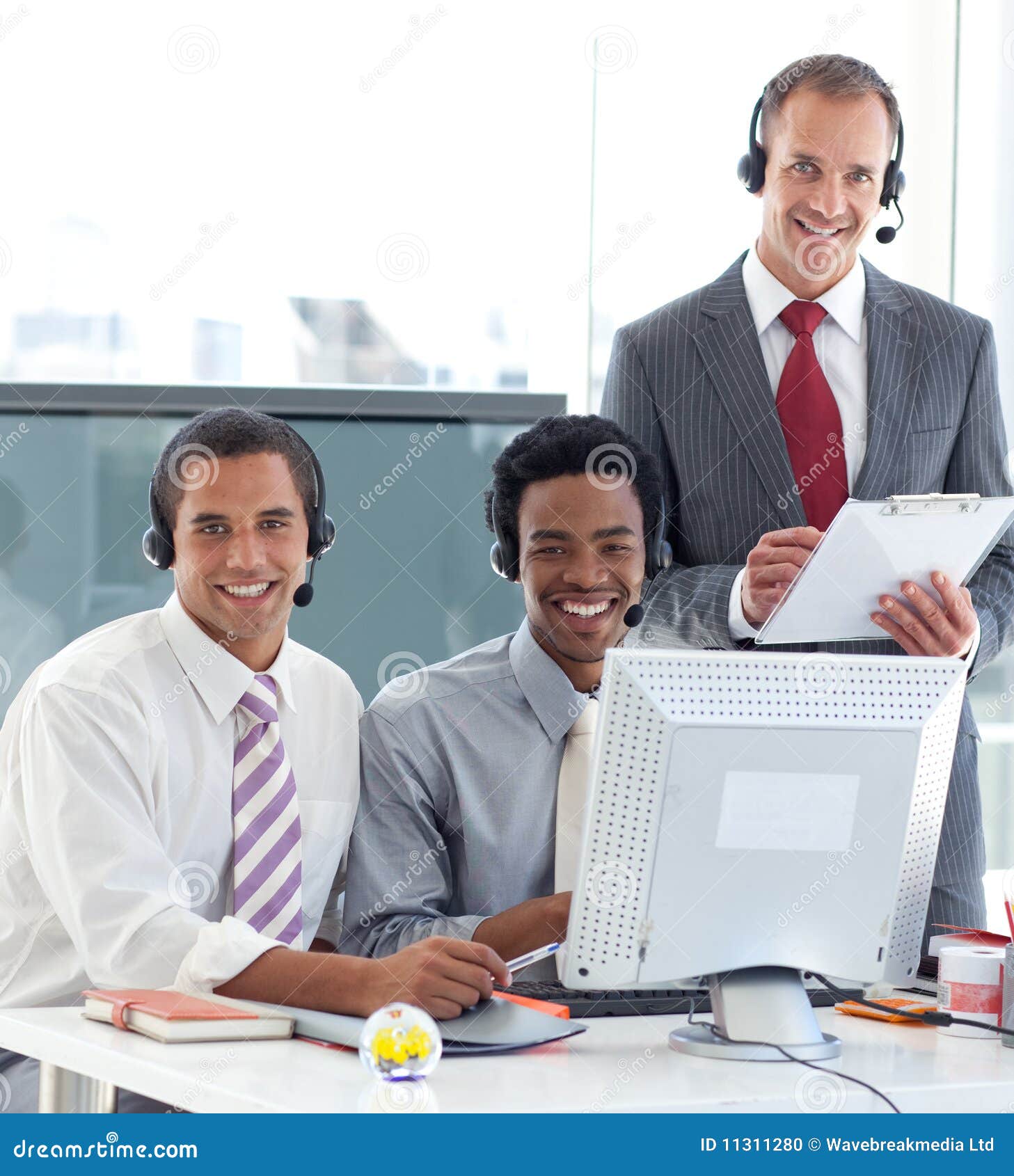 Manager Talking To Two Businessmen Stock Photo - Image of person ...