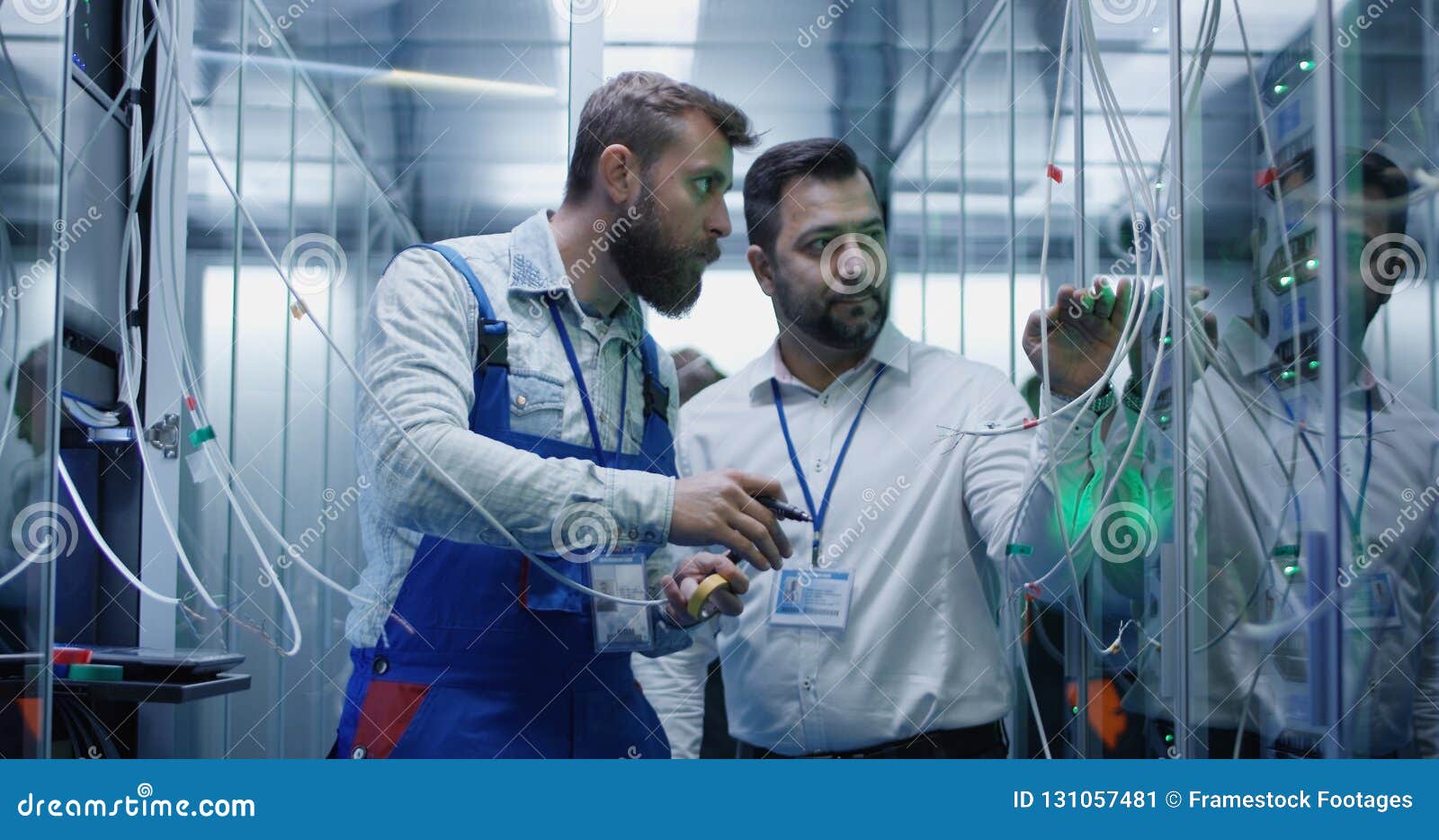 Manager and Technician Working in a Data Center Stock Image - Image of ...