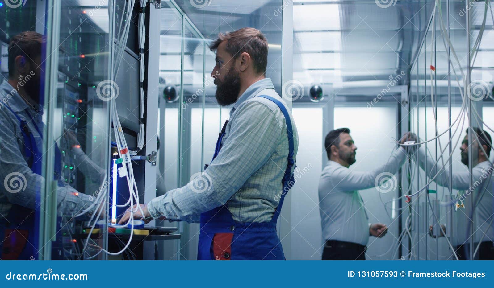 Manager and Technician Working in a Data Center Stock Image - Image of ...