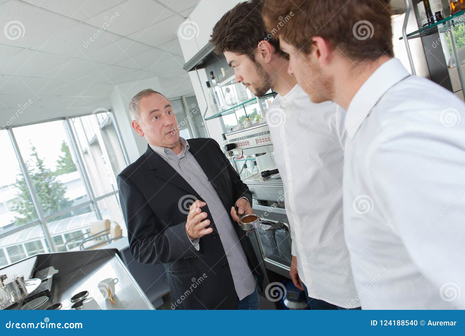 Manager Training Two New Waiting Staff Stock Photo - Image of room ...