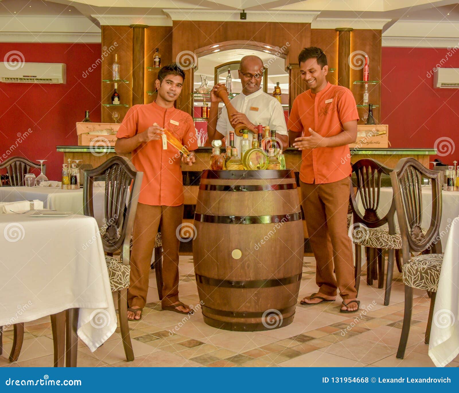 Manager and Two Waiters in Uniform in the Restaurant Editorial Stock ...