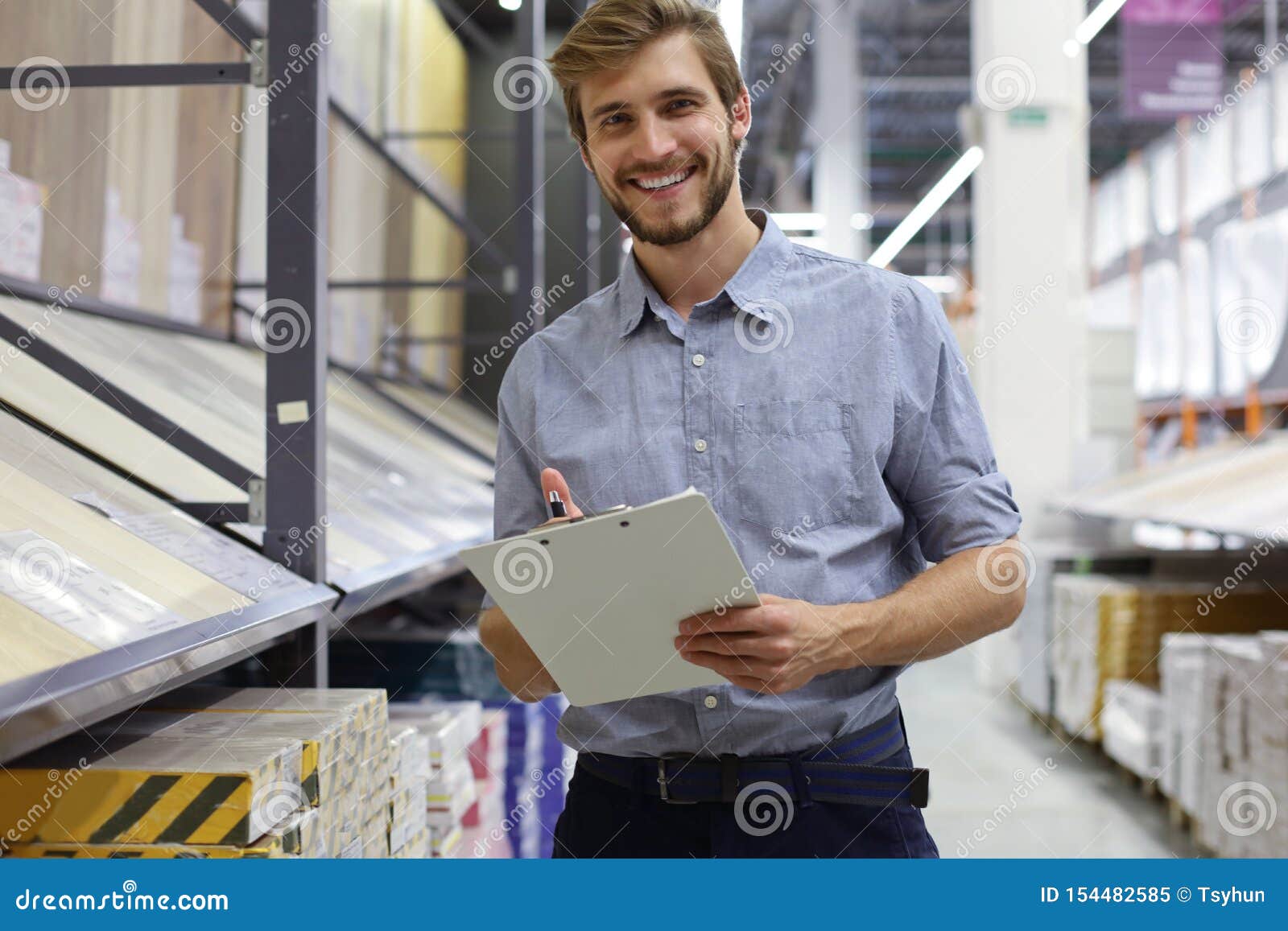 Manager Use His Tablet for Online Checking Products Available Stock ...