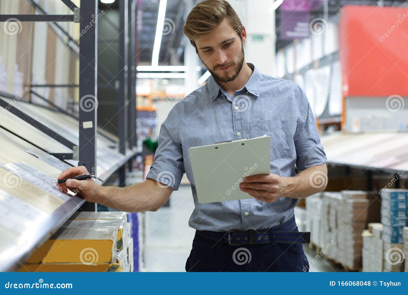 Manager Use His Tablet for Online Checking Products Available Stock ...