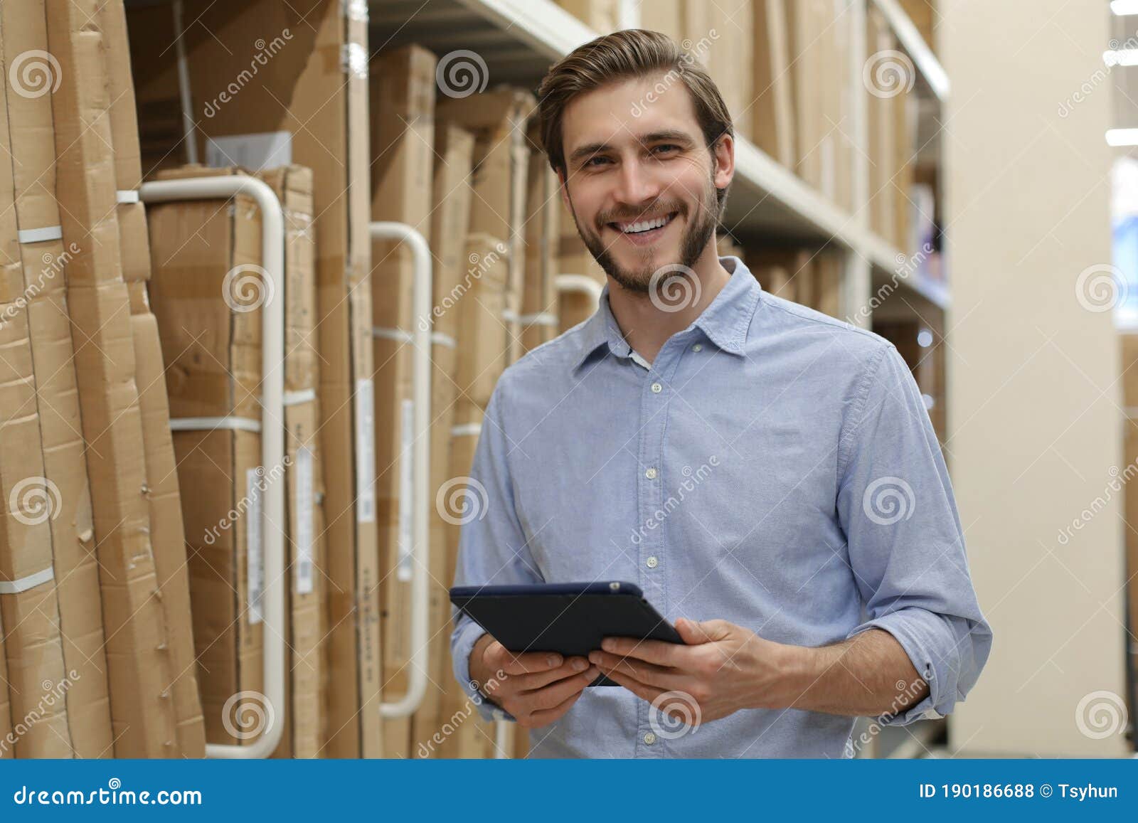 Manager Use His Tablet for Online Checking Products Available Stock ...