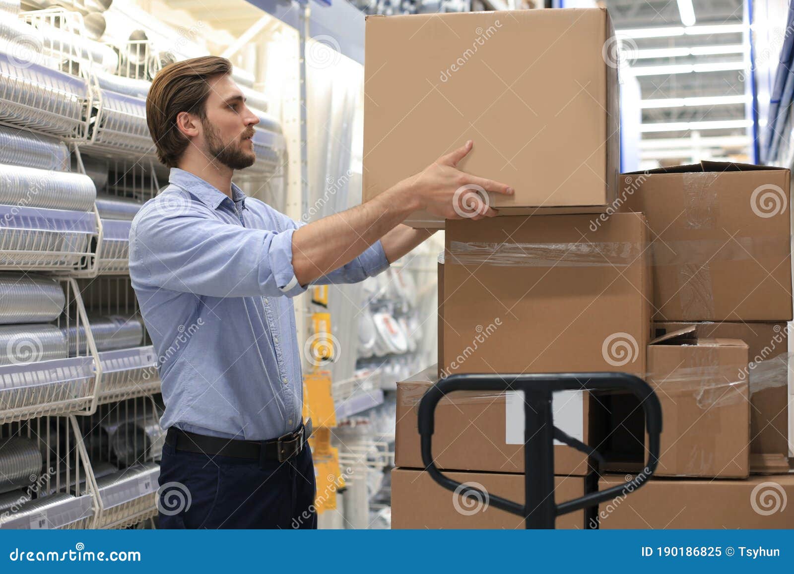 Manager Use His Tablet for Online Checking Products Available Stock ...