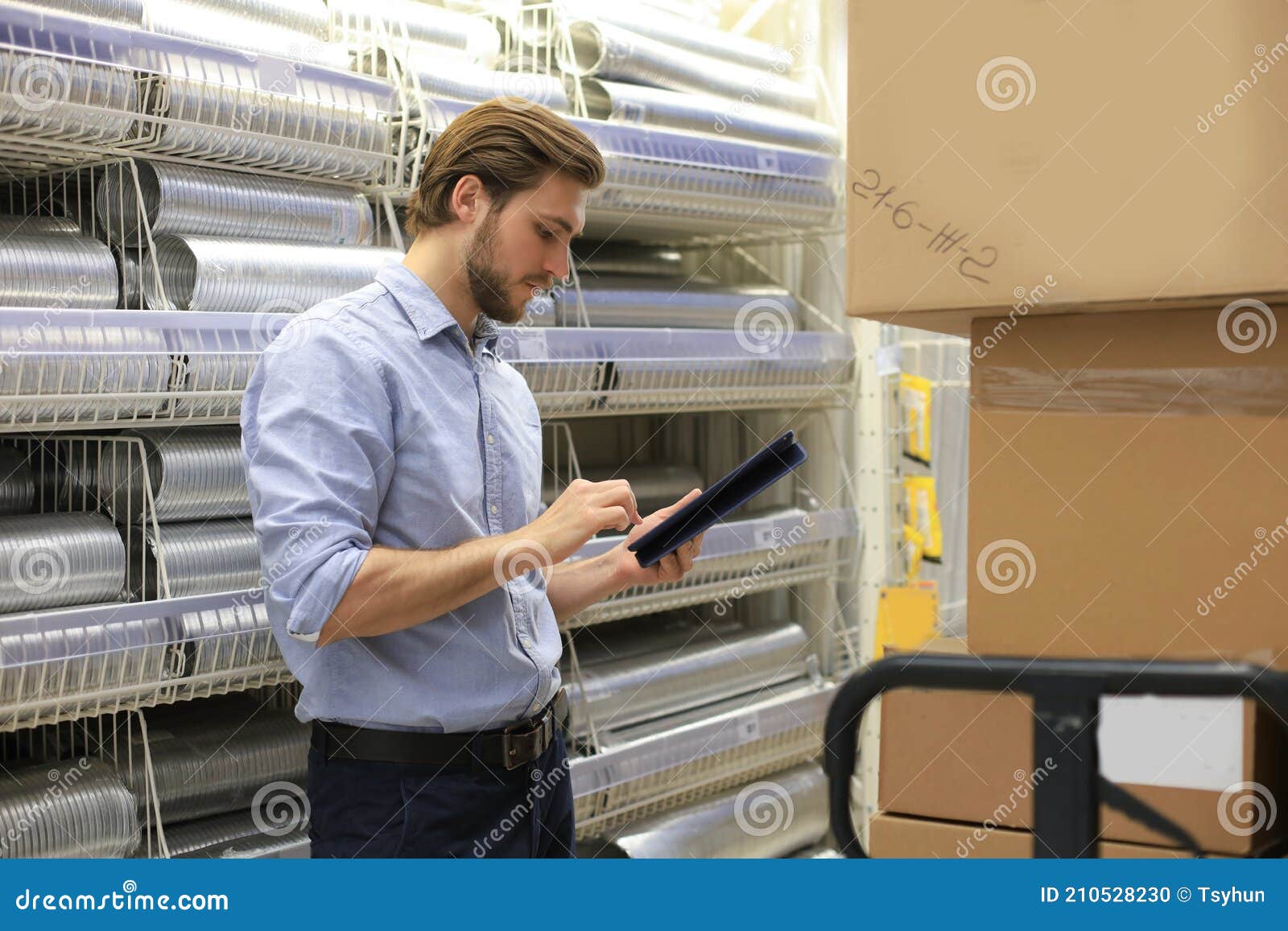 Manager Use His Tablet for Online Checking Products Available Stock ...