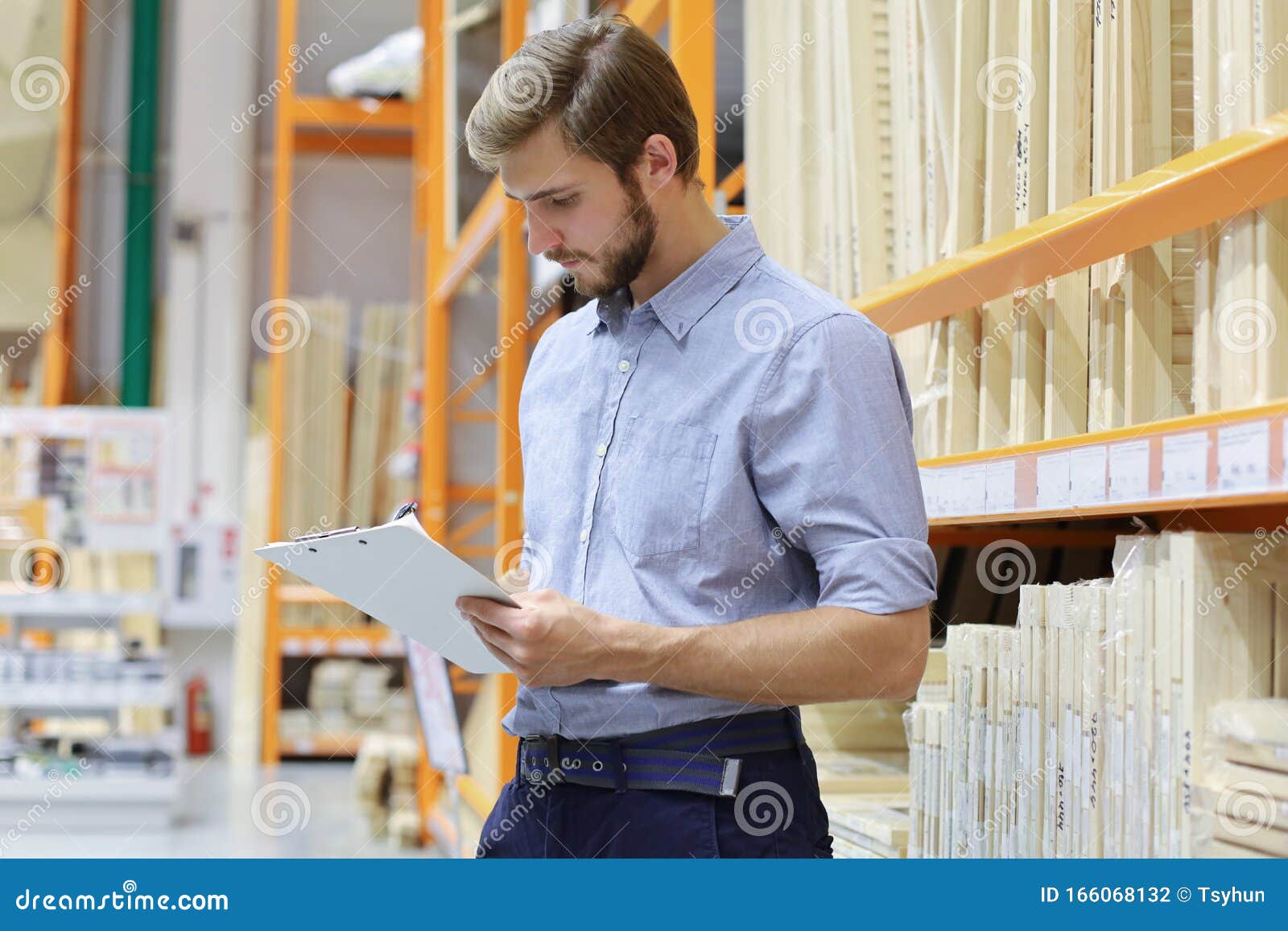 Manager Use His Tablet for Online Checking Products Available Stock ...