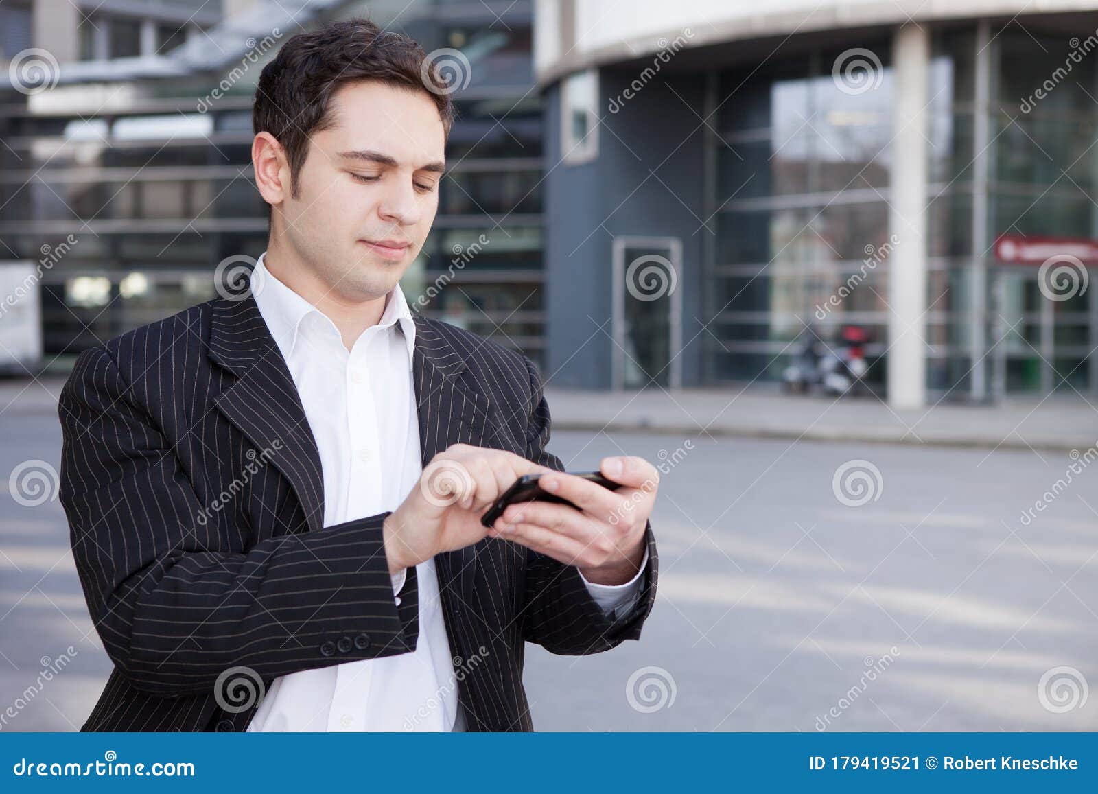Manager uses smartphone stock image. Image of networking - 179419521