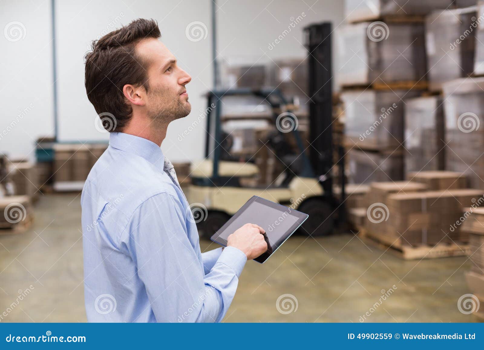 Manager Using Digital Tablet in Warehouse Stock Image - Image of ...
