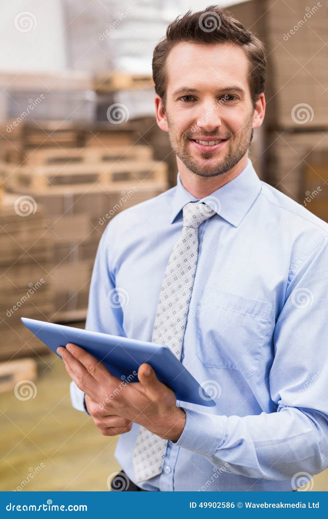 Manager Using Digital Tablet in Warehouse Stock Photo - Image of ...