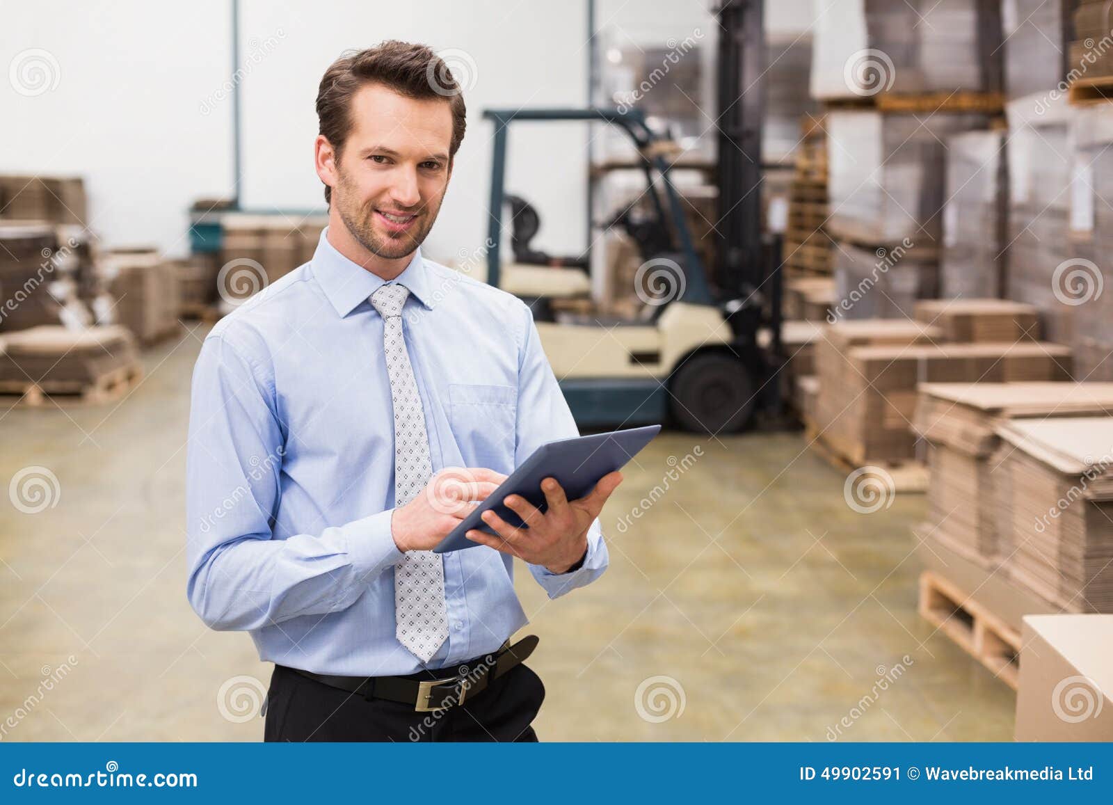 Manager Using Digital Tablet in Warehouse Stock Image - Image of happy ...