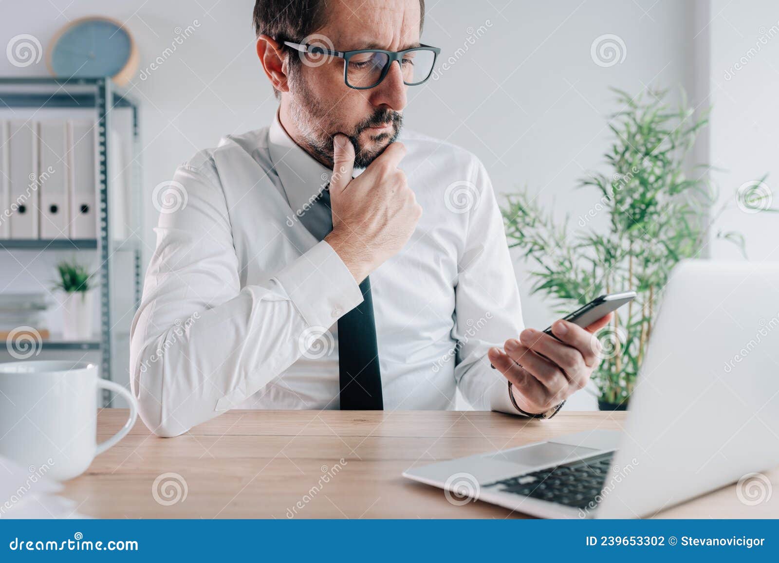 Manager Using Internal SMS for Employee Communication, Businessman with ...