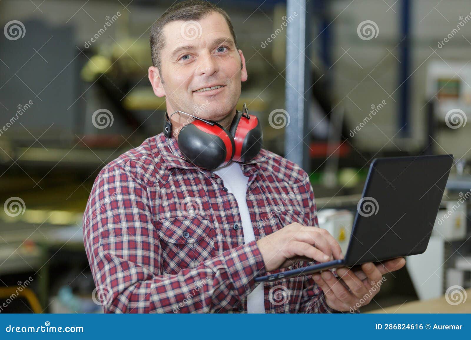 Manager Using Laptop in Warehouse Stock Photo - Image of business ...