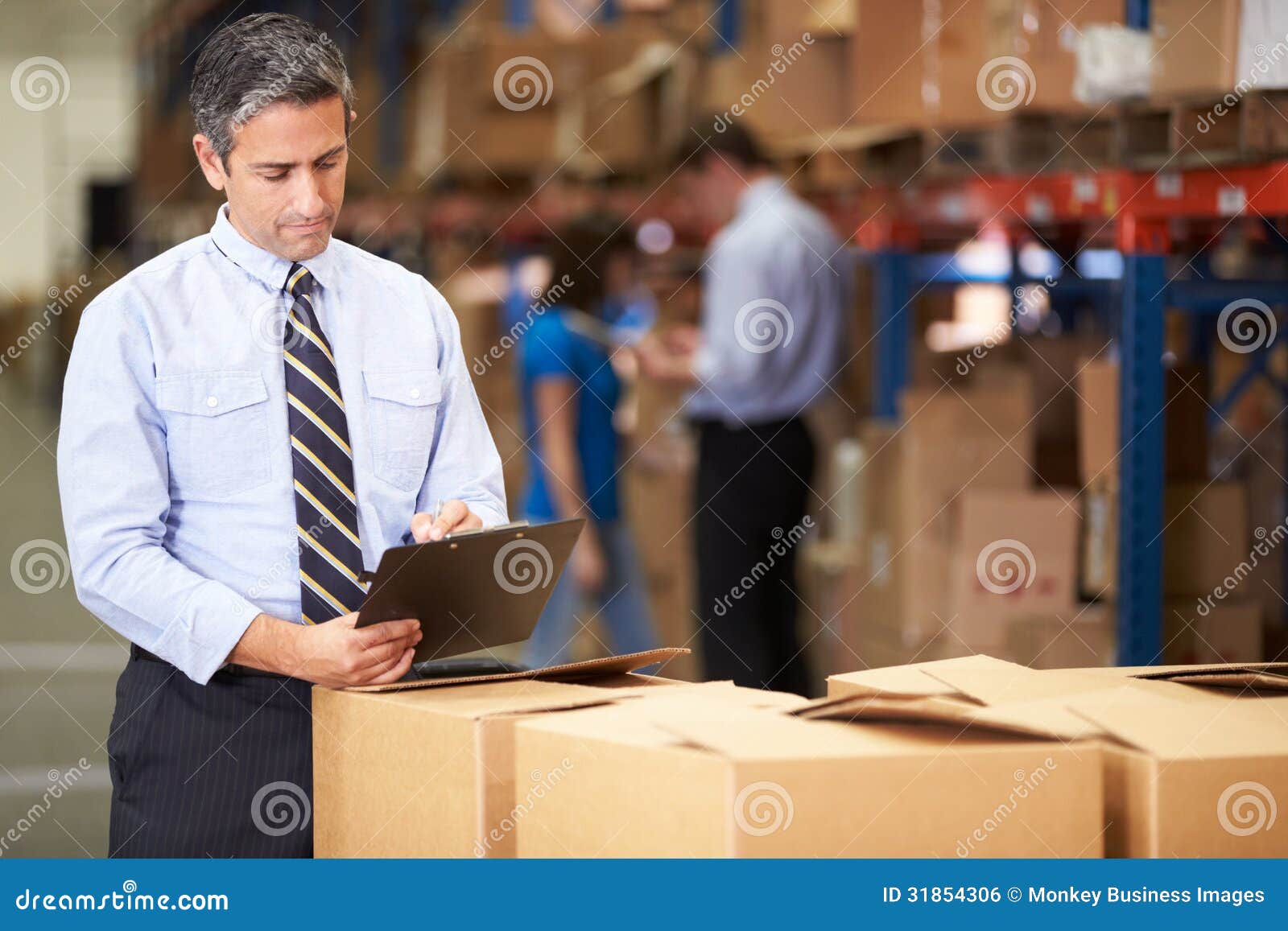 Manager in Warehouse Checking Boxes Stock Photo - Image of person ...