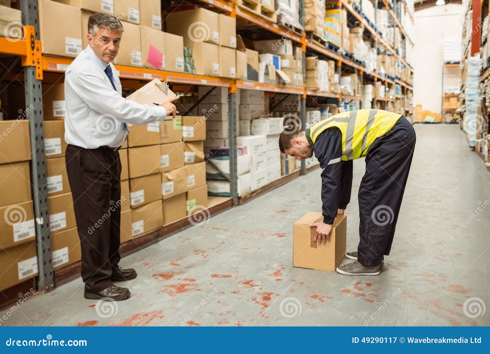 Manager Watching Worker Carrying Boxes Stock Image - Image of high ...
