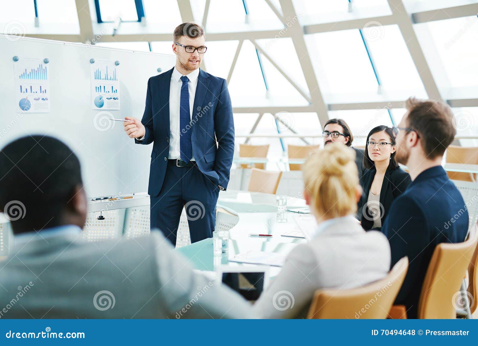 Manager by whiteboard stock photo. Image of businesspeople - 70494648