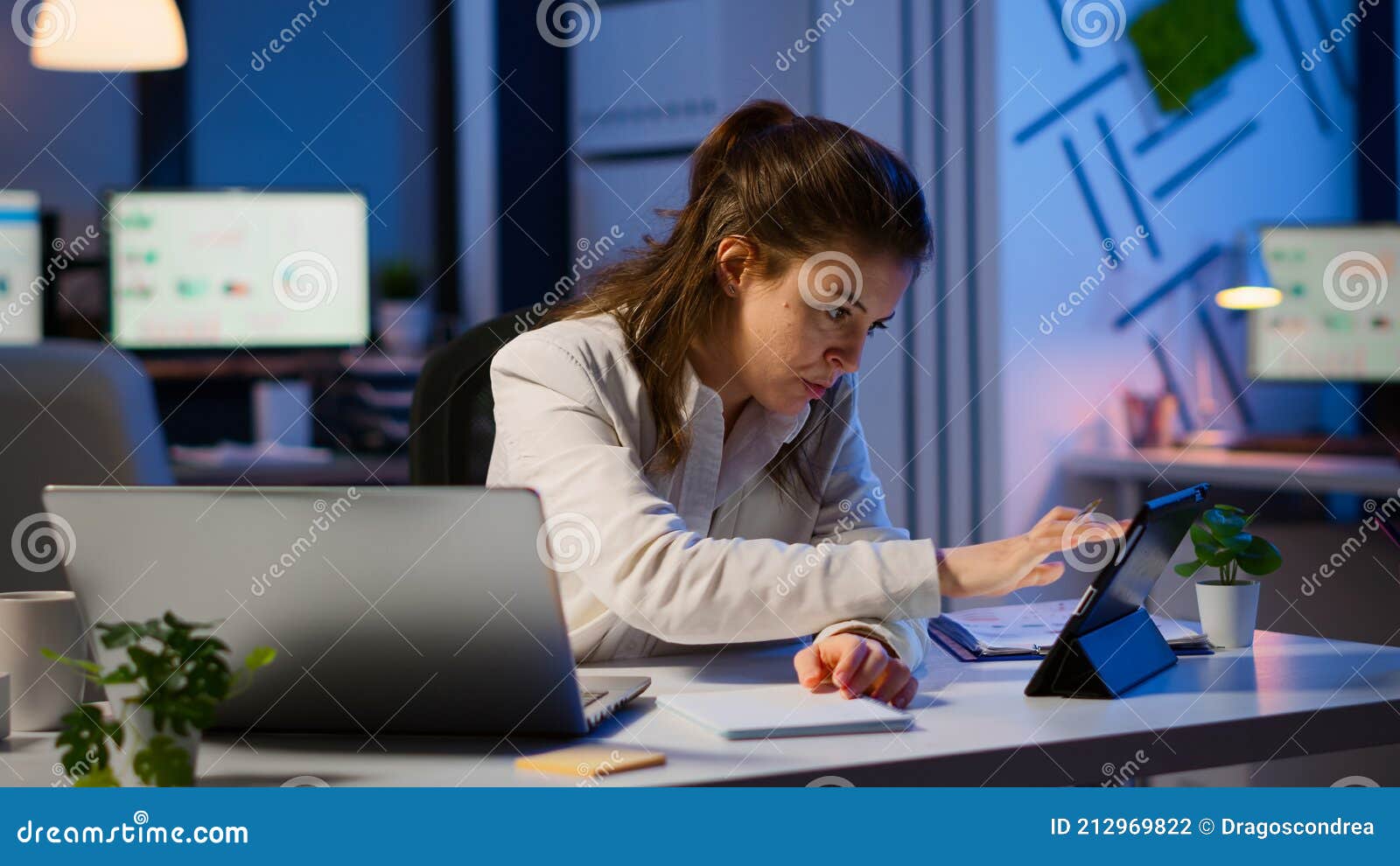 Manager Woman Using Laptop and Tablet in Same Time Working Overtime ...