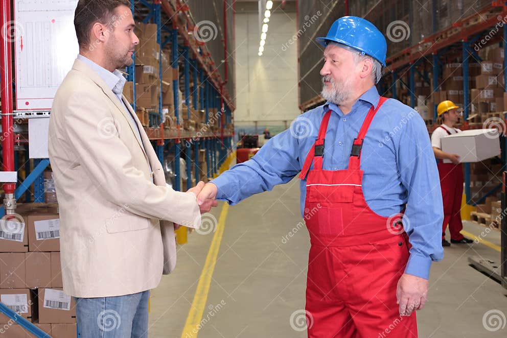 Manager and Worker Handshake Stock Photo - Image of merchandise, crate ...