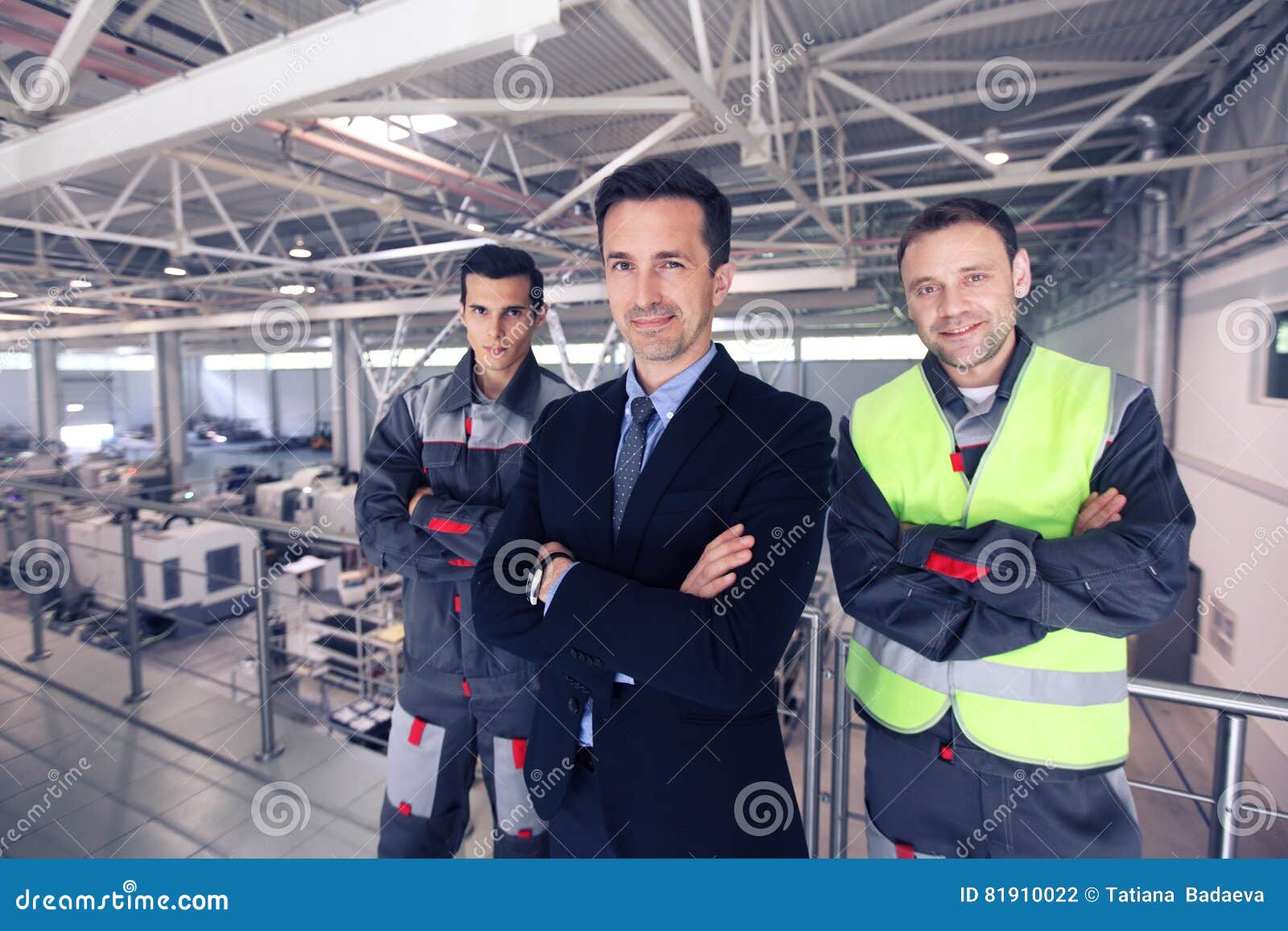 Manager and Workers in Factory Stock Photo - Image of portrait ...