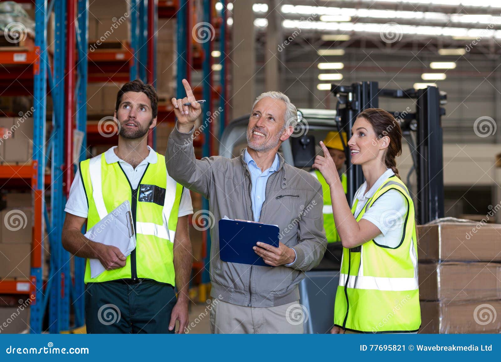 Manager and Workers are Looking Shelves and Pointing Stock Image ...
