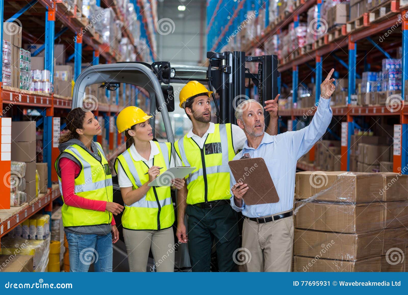 Manager and Workers are Looking Shelves and Pointing Stock Image ...