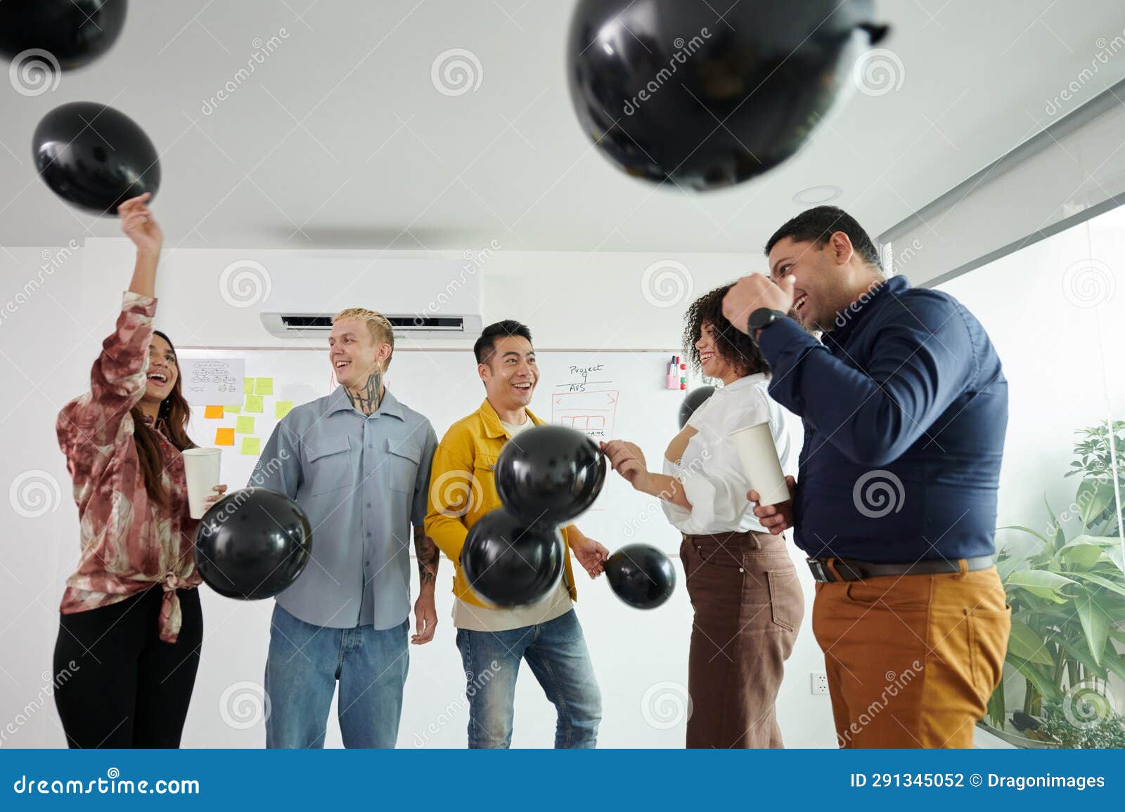 Managers and Developers Throwing Balloons Stock Photo - Image of ...