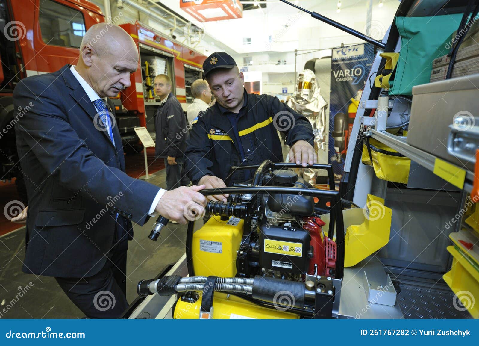 Managers Discussing Equipment for Technical Rescue and Support, Compact ...