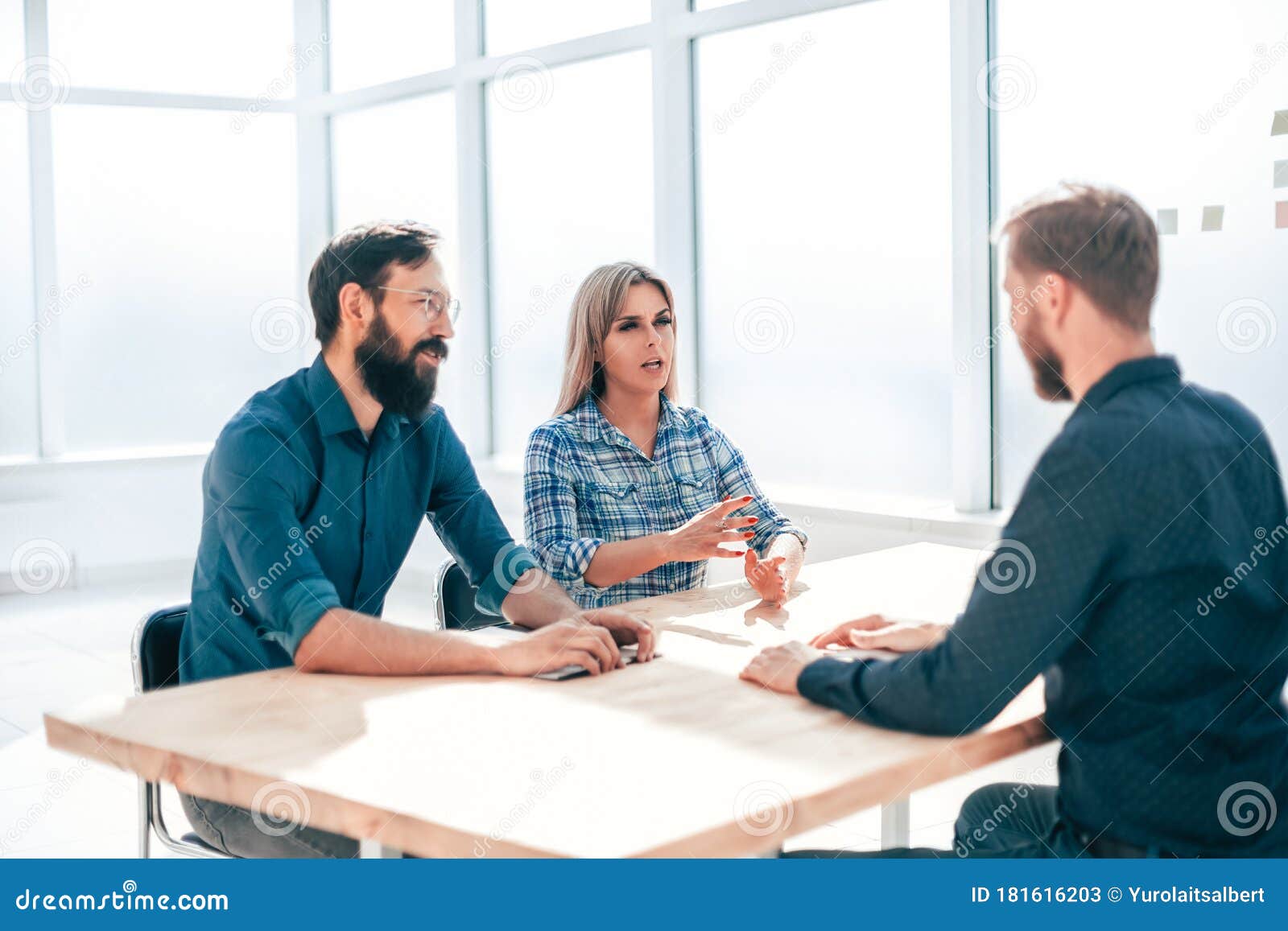 Managers and Job Seeker Sitting at the Table during the Interview Stock ...