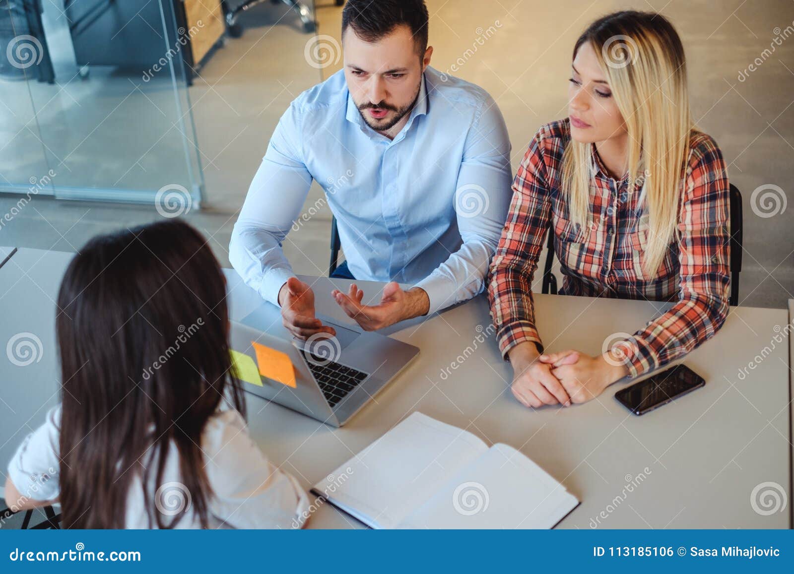 Managers Talking Seriously while Interviewing Female Candidate ...