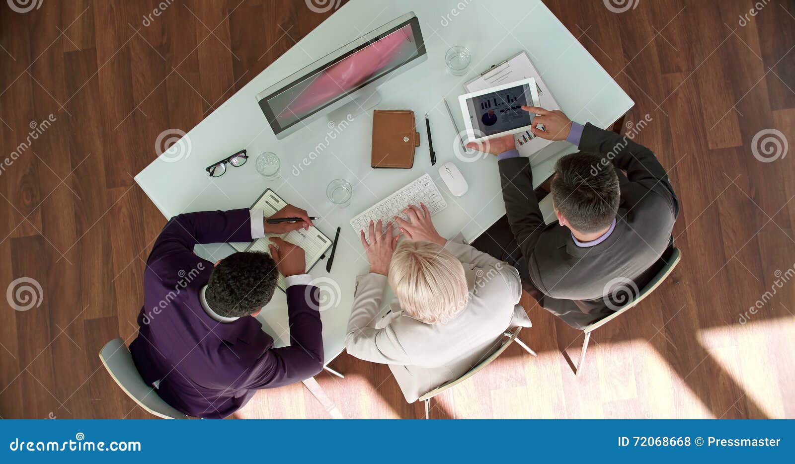 Managers teamworking stock photo. Image of touchpad, teamwork - 72068668