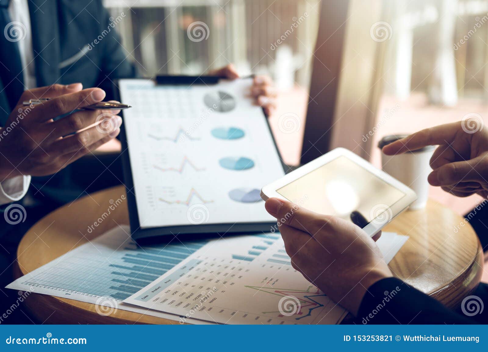 Managers are Using Tablets To Analyze Sales Cost Reports and Explain ...