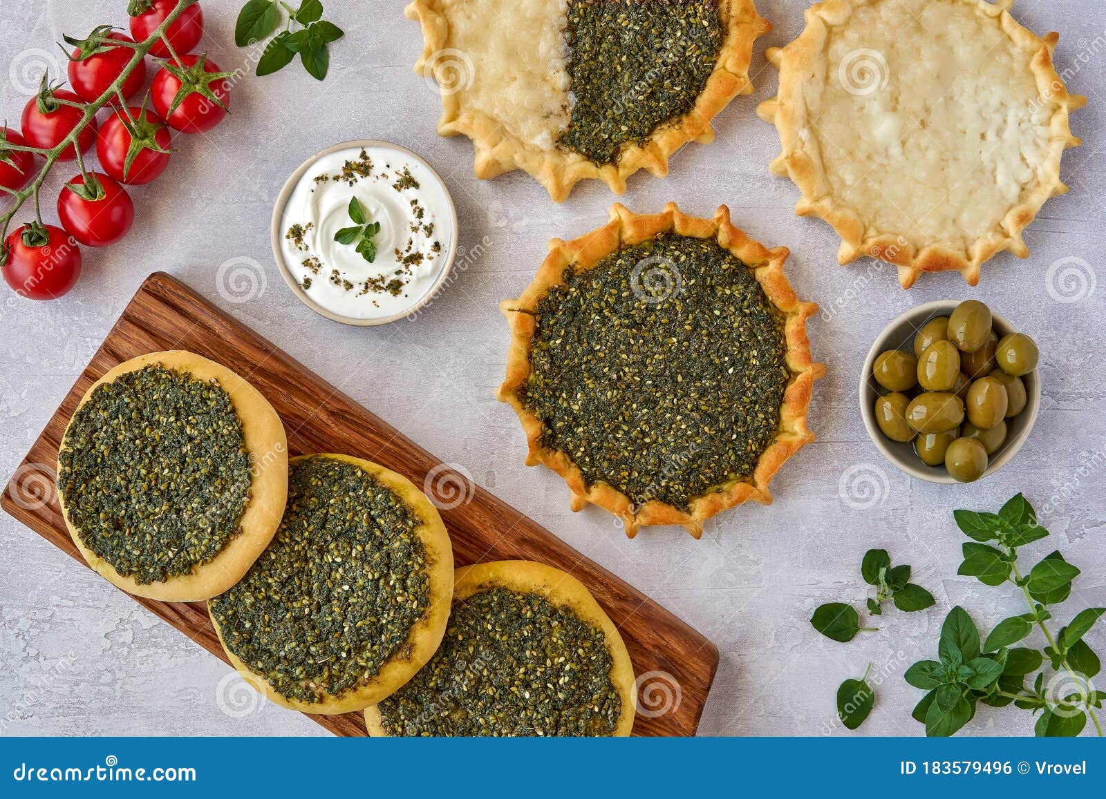 Manakeesh with Zaatar and White Cheese on Wooden Board. Top View Stock ...