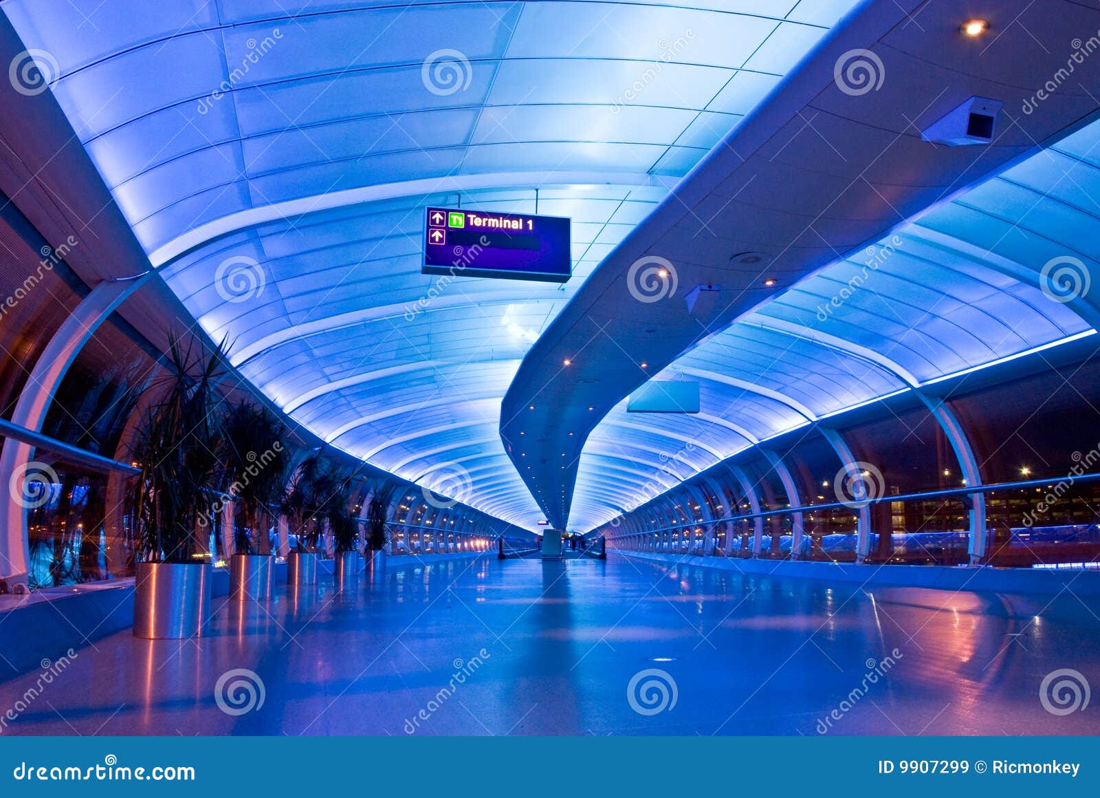 Illuminated Travelator And Directional Signs Stock Photography ...