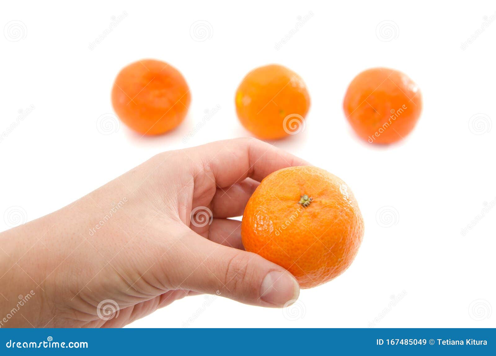 Mandarin in Hand Isolated on White Background. Stock Image - Image of ...