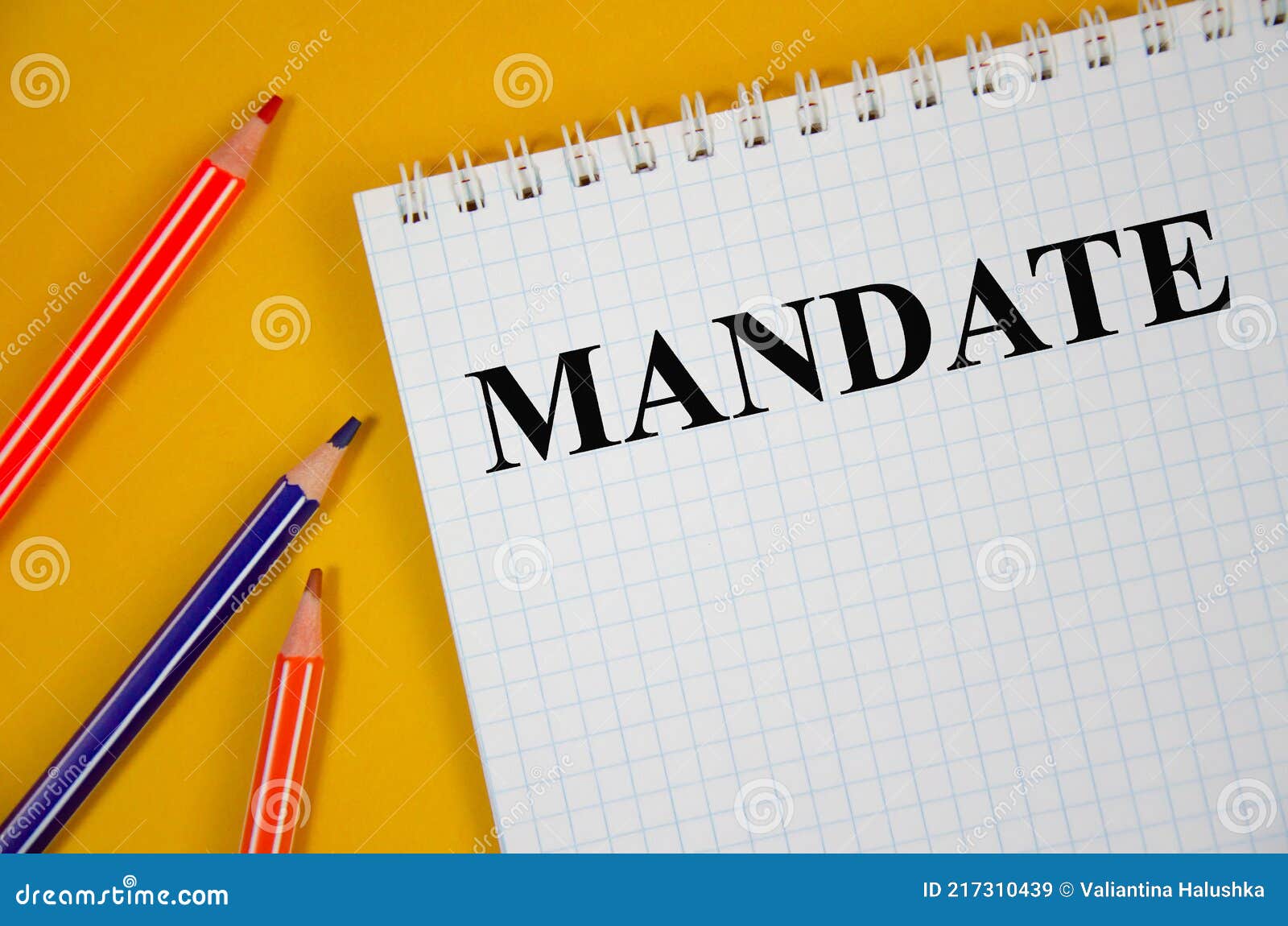 Mandate Written on White Notepad and Yellow Background Stock Image ...