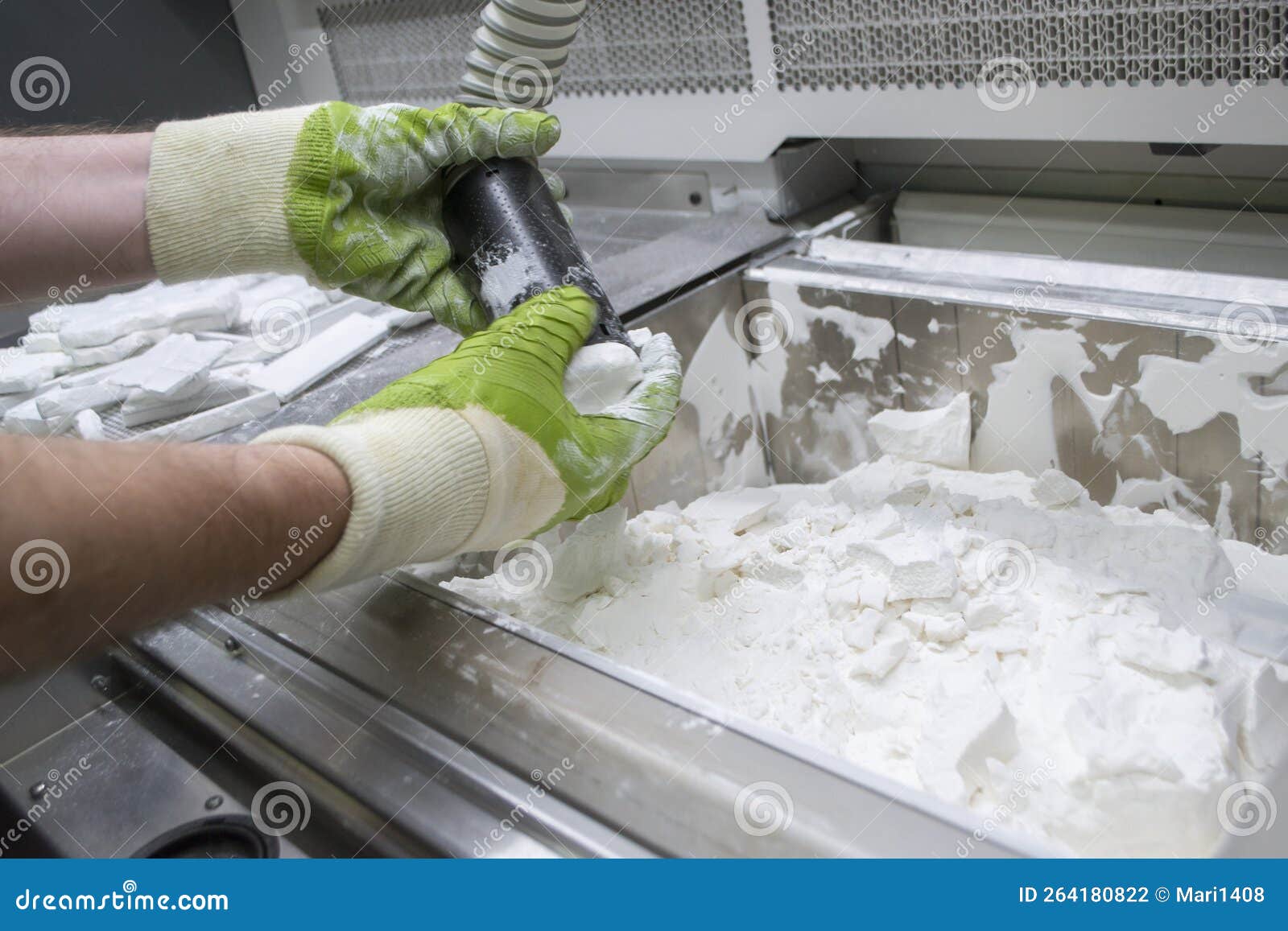 Worker Taking Out Models of White Polyamide Powder and Cleaning Them ...