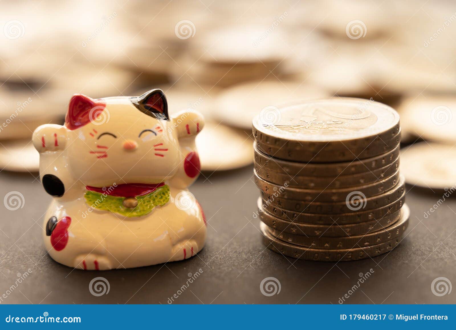 Maneki Neko or Beckoning Cat Placed on a Coin Stack Stock Image - Image ...