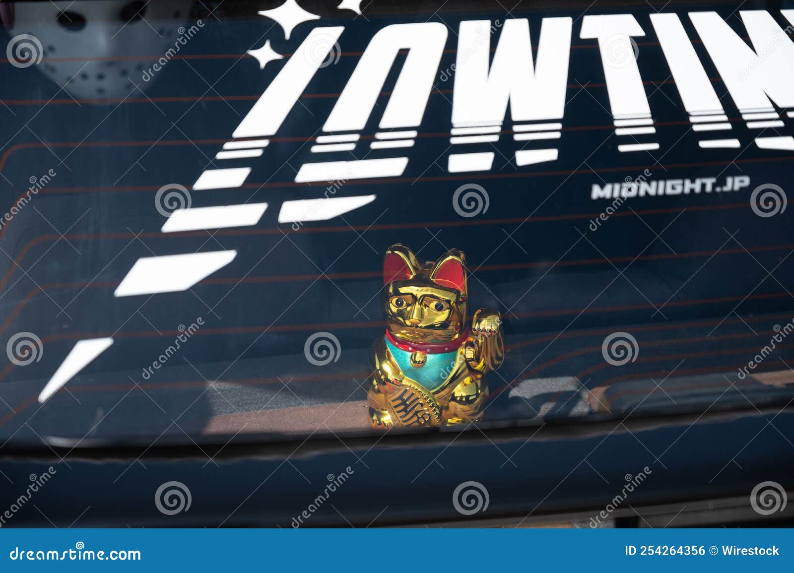 Maneki-neko Golden Kitten Toy in the Car Editorial Photo - Image of ...