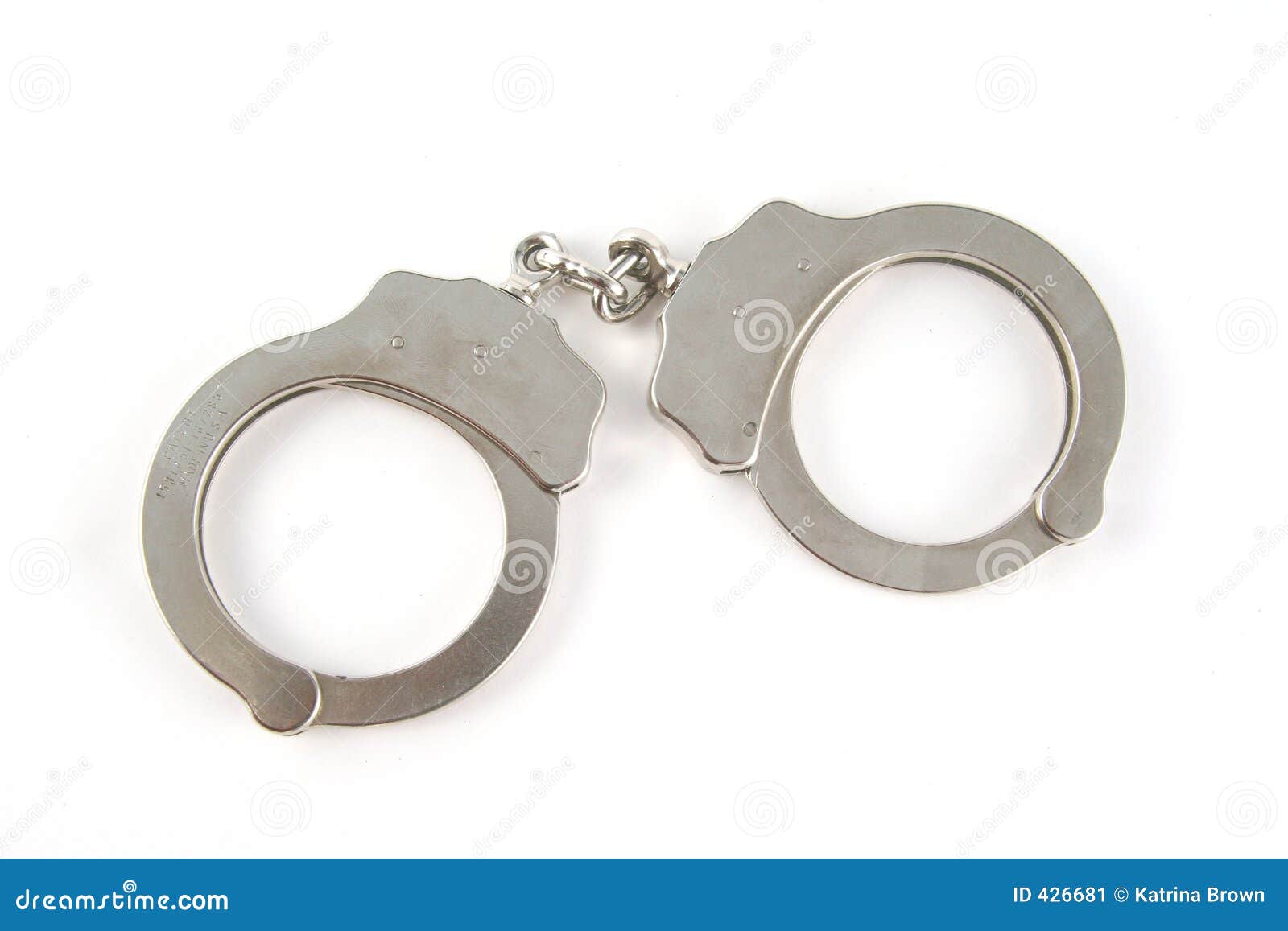 Manette della polizia immagine stock. Immagine di scena - 426681