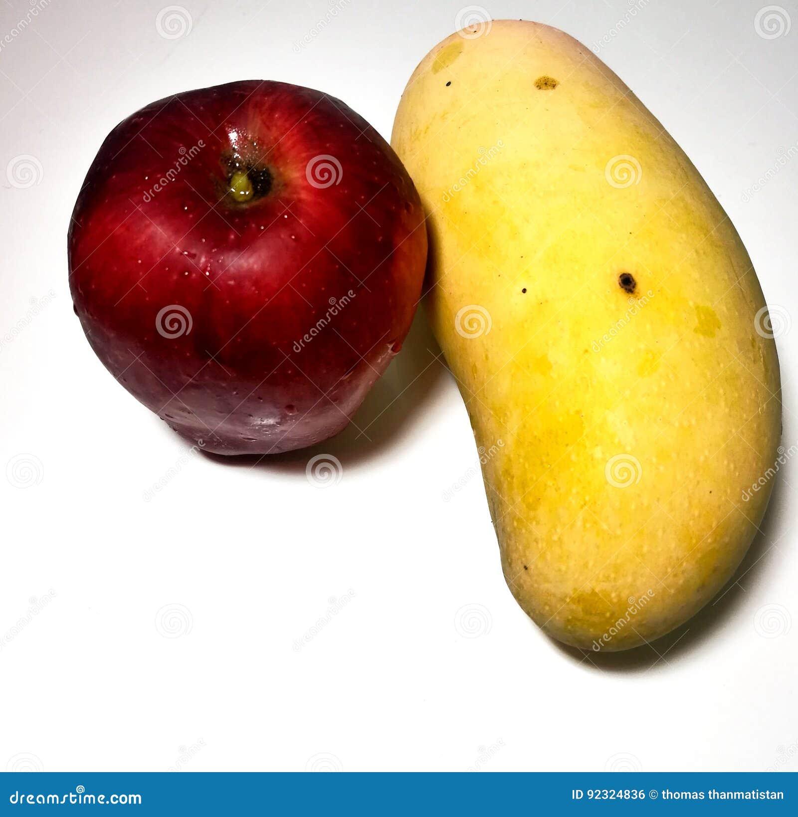 Mango & apple stock photo. Image of yellow, contrast - 92324836