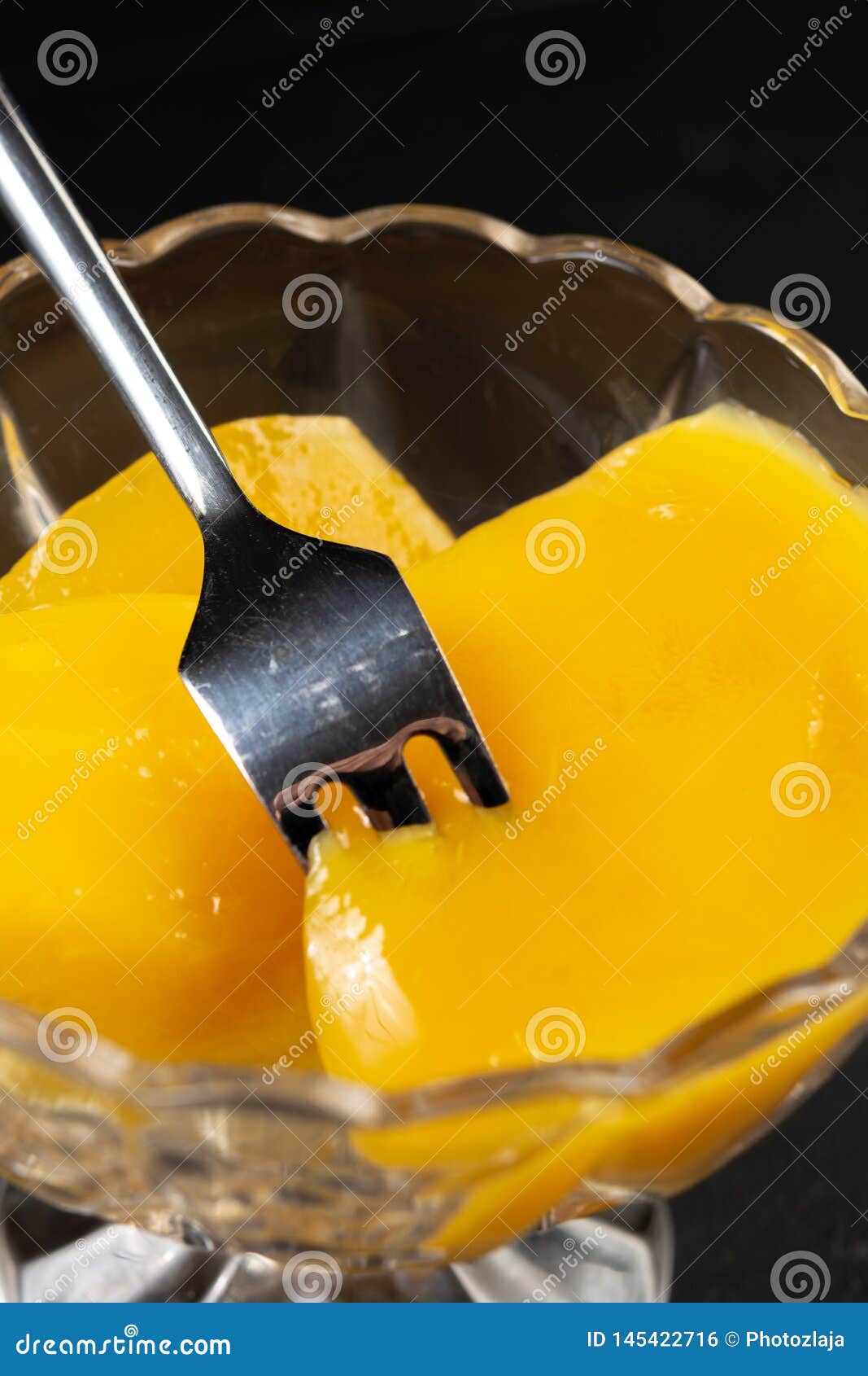 Mango Compote Closeup with Fork in the Mango Stock Photo - Image of ...