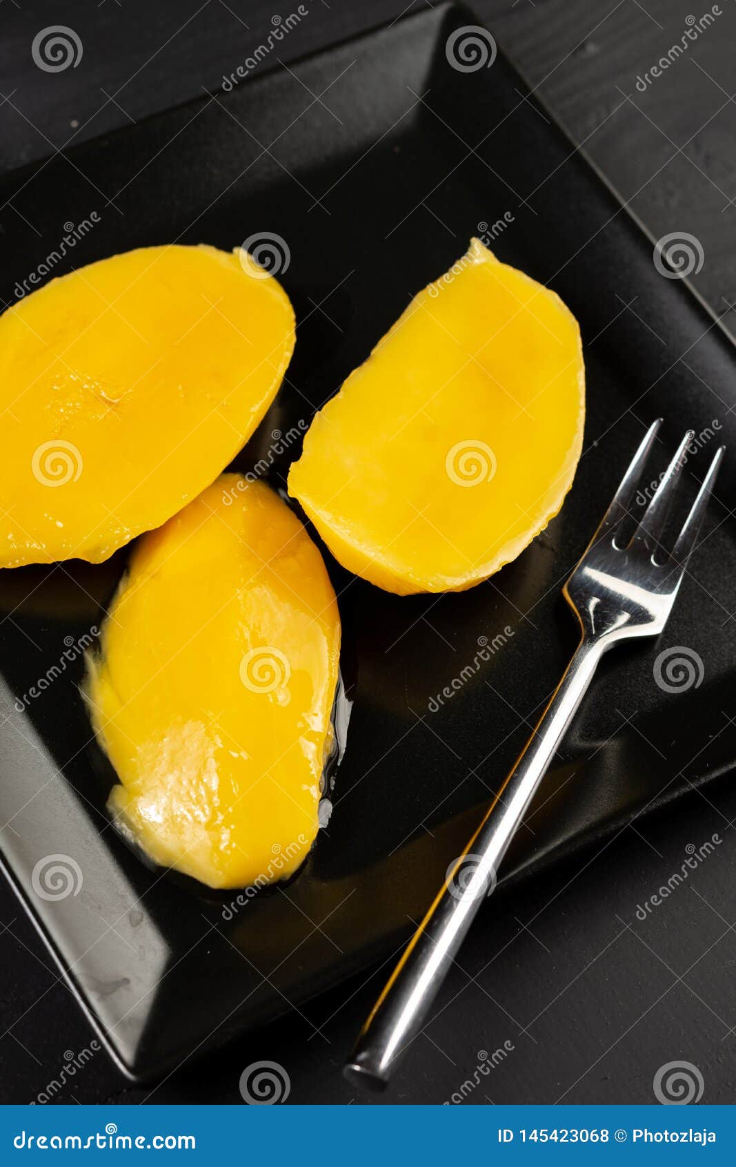 Mango Compote Served on the Plate with Fork Stock Photo - Image of ...