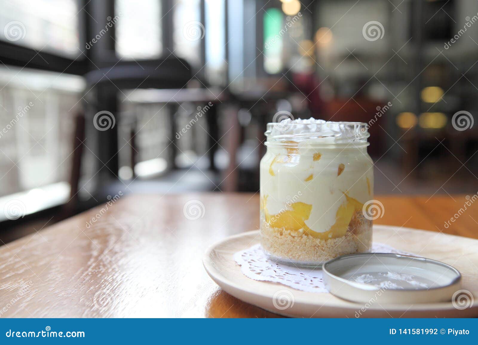 Mango with cream, Dessert stock photo. Image of sweet - 141581992