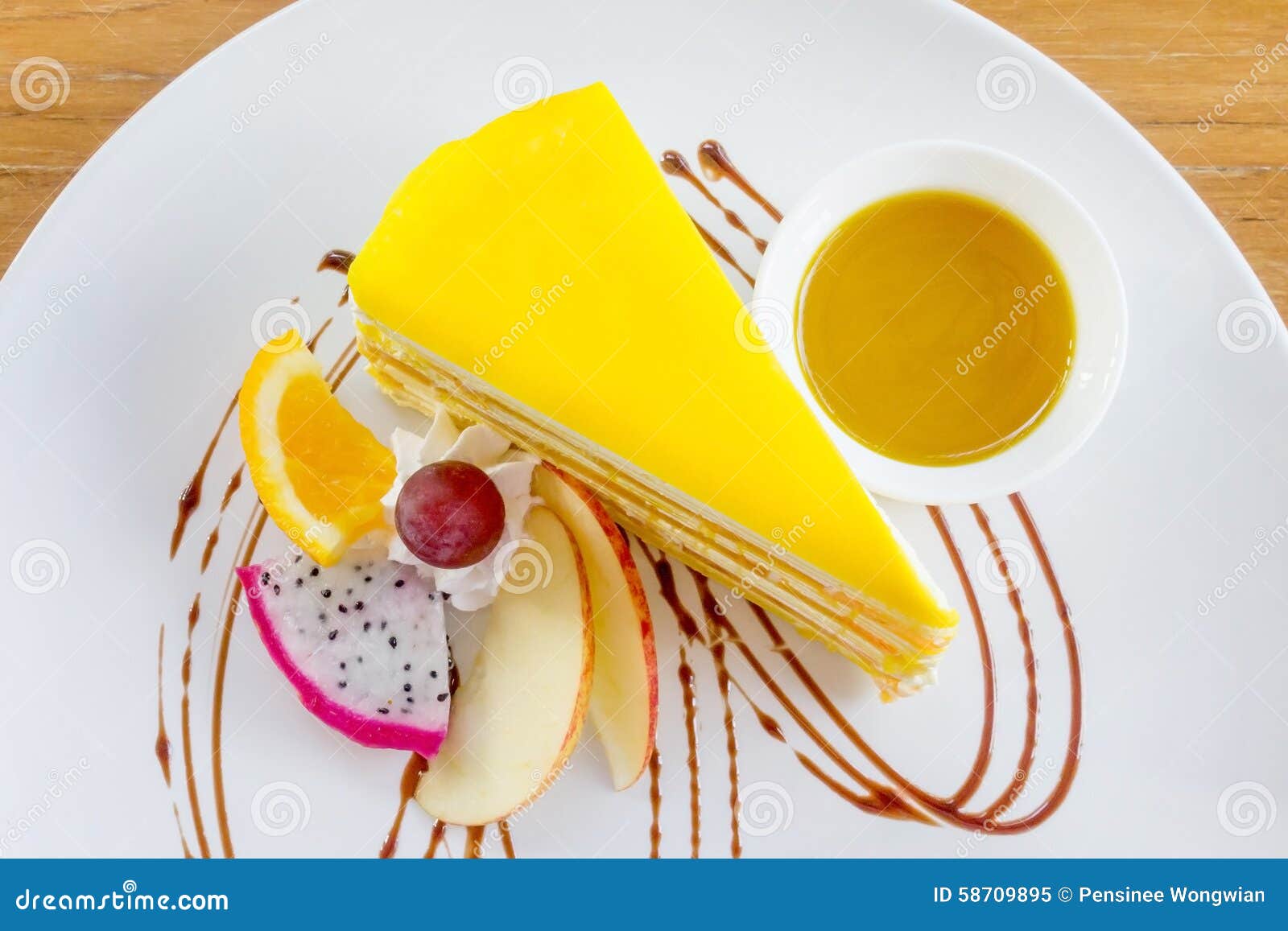 Mango Crepe Cake Serve with Mango Sauce and Fresh Fruit Stock Image ...